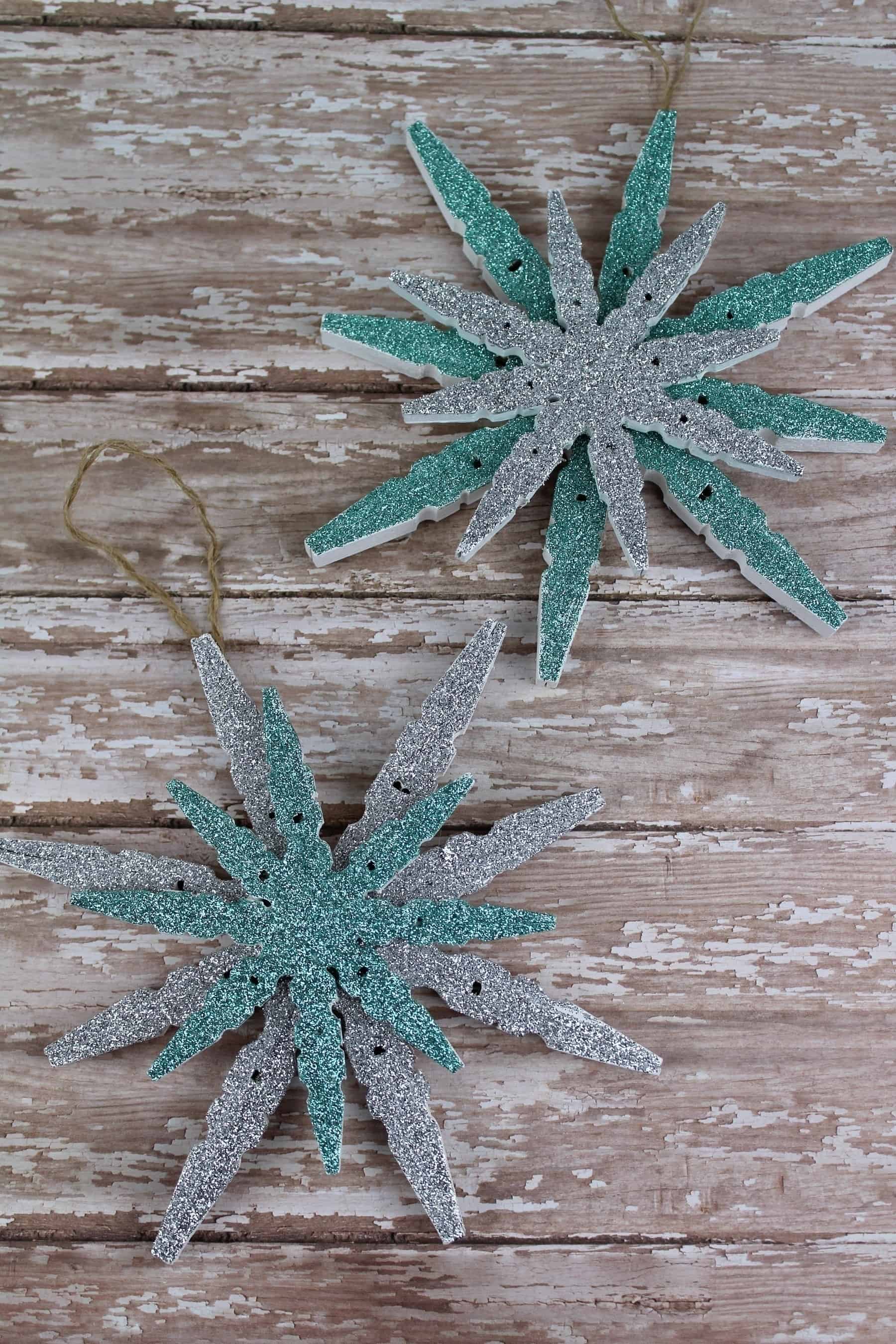 This Clothespin Glitter Snowflake Ornaments is a fun holiday craft for ...